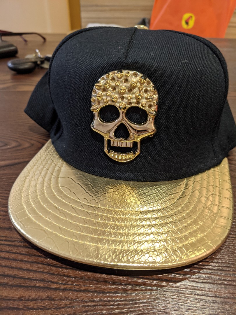Black and gold cap, Men's Fashion, Watches & Accessories, Caps & Hats ...