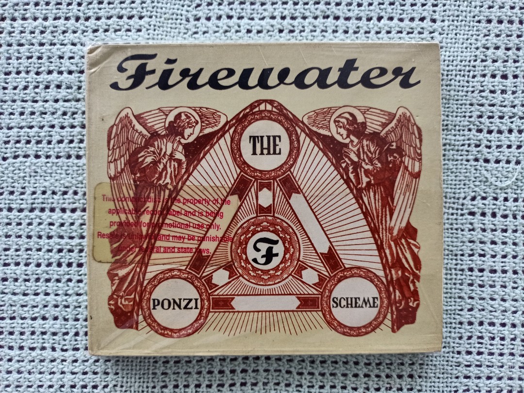 CD The Ponzi Scheme : firewater, Hobbies & Toys, Music & Media, CDs ...