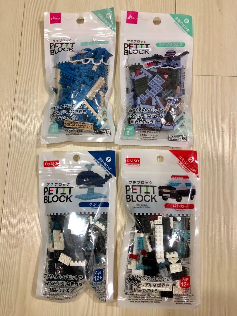 Bundle of 4 Petit Block sets - Triceratops, Spinosaurus, Whale, Police ...