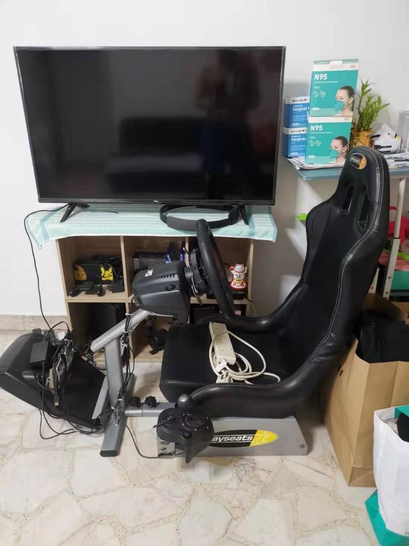 Racing simulator seat + Logitech steering wheel, Video Gaming, Gaming ...