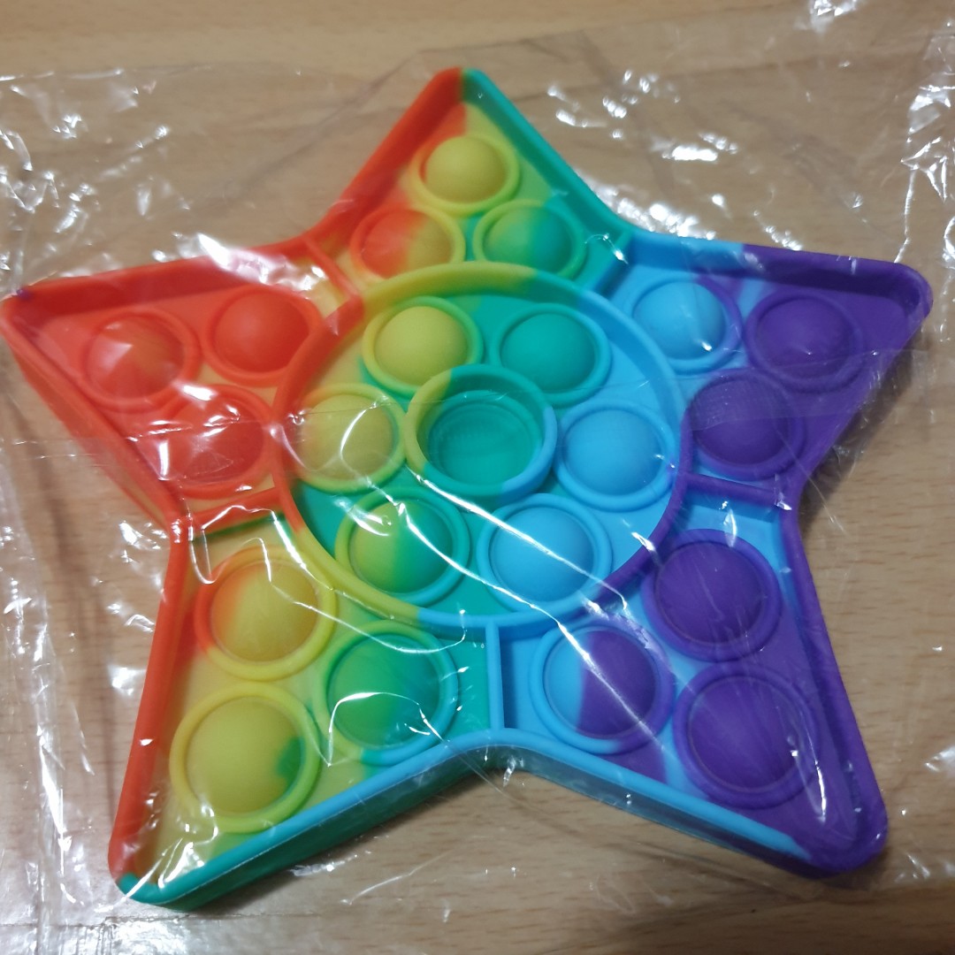 Rainbow star pop it fidget toy, Hobbies & Toys, Toys & Games on Carousell