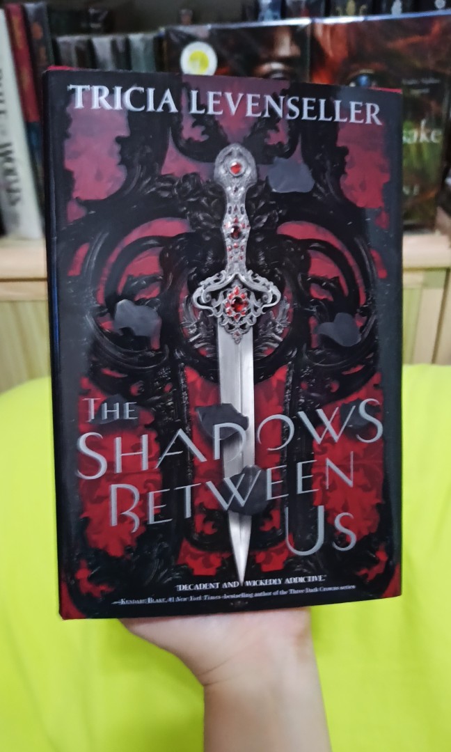 THE SHADOWS BETWEEN US by Tricia Levenseller, Hobbies & Toys, Books ...