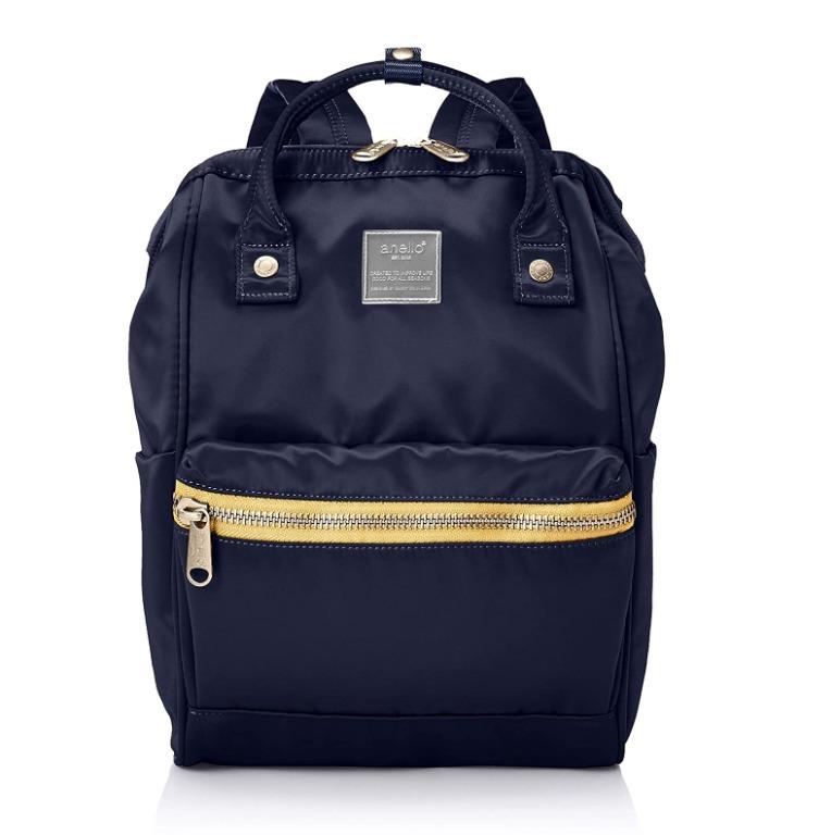 日本 Anello 深藍色珠光 防潑水牛津布 SABRINA 輕量 背囊, 女裝, 手袋及銀包, 背囊 - Carousell