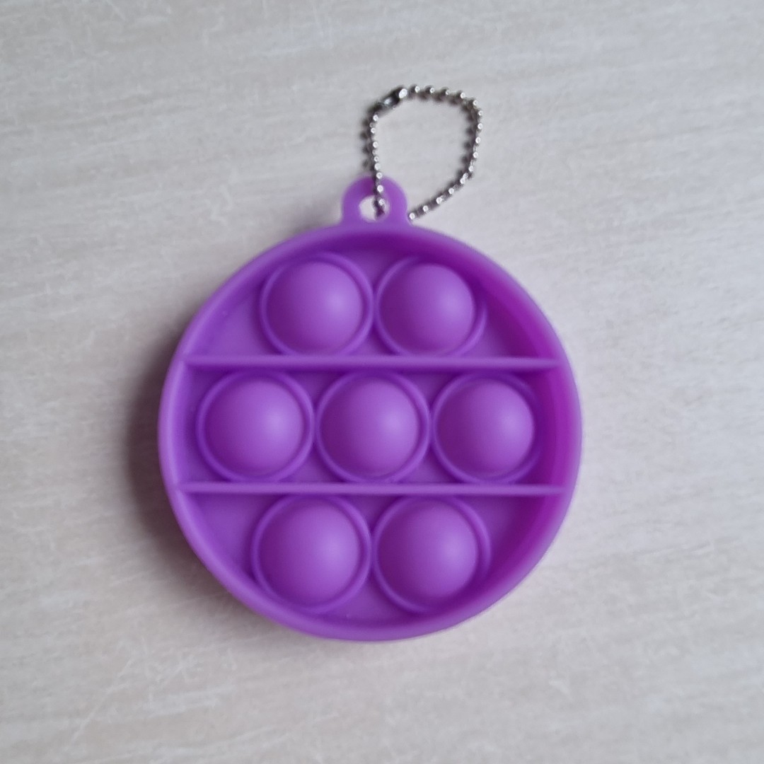 small purple pop it keychain, Hobbies & Toys, Toys & Games on Carousell