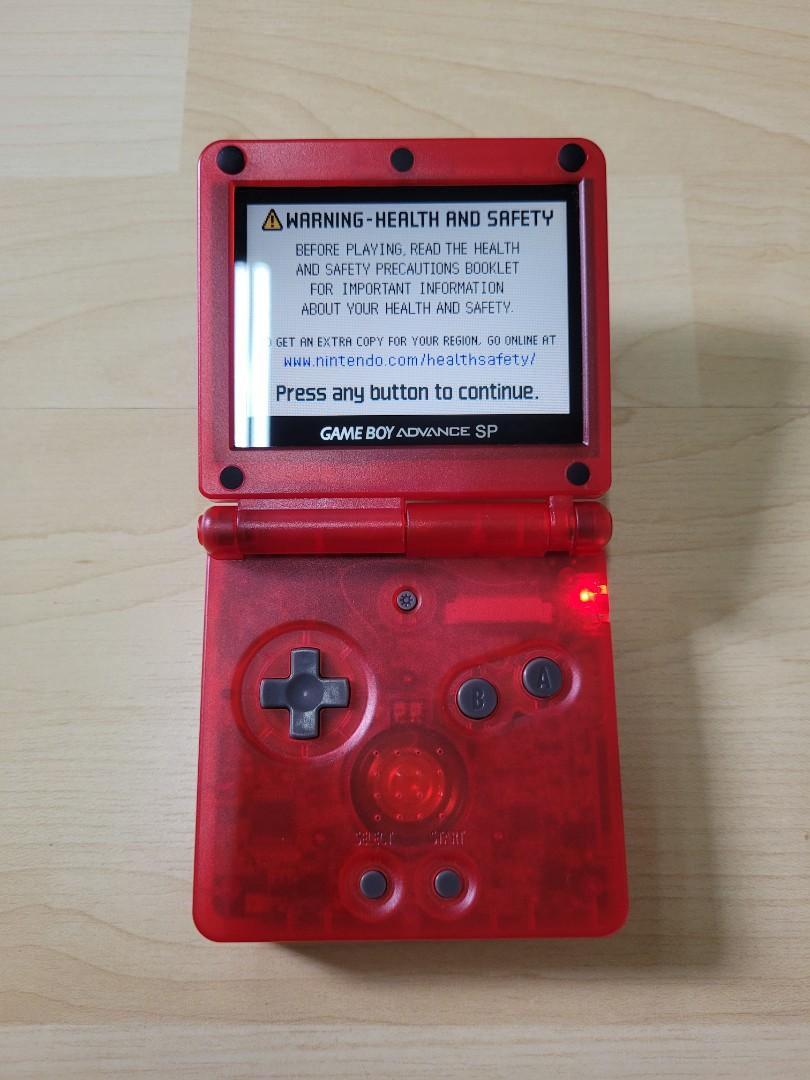Gameboy advance SP ( translucent red shell and dark grey button ) with ...