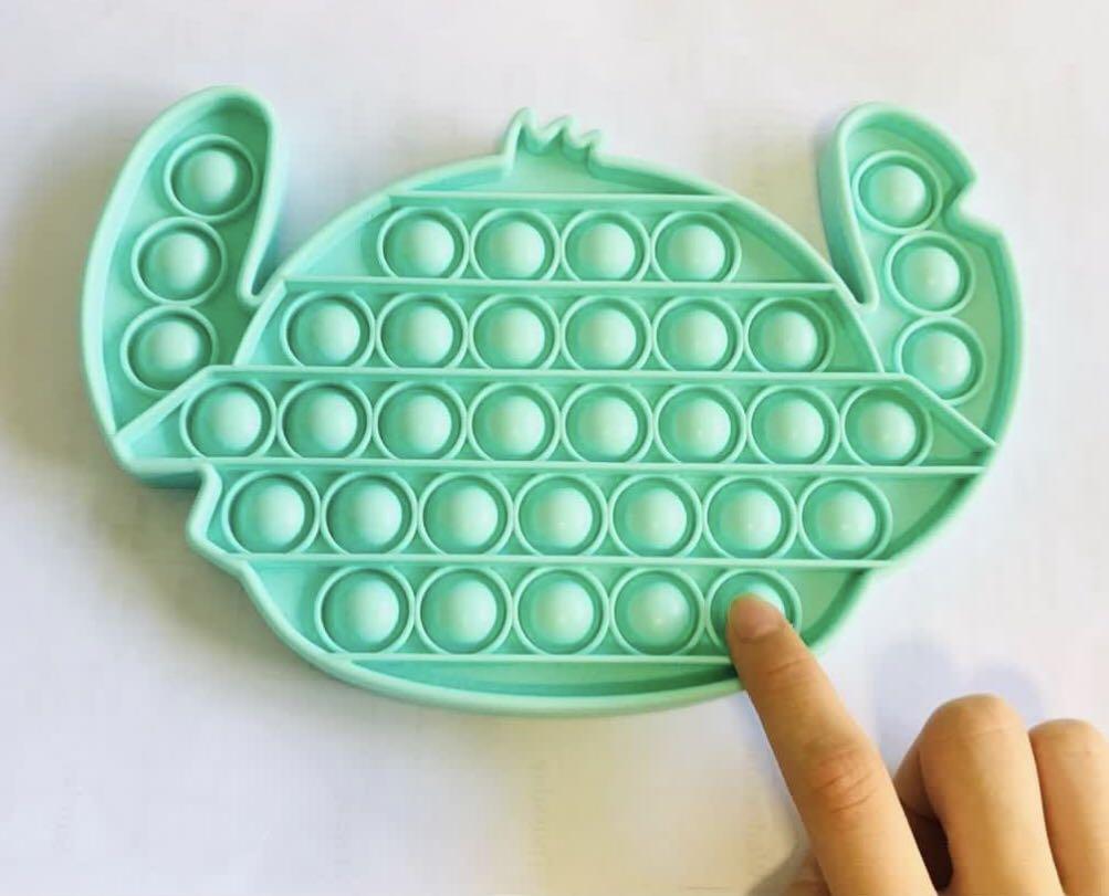 Stitch pop it, Hobbies & Toys, Toys & Games on Carousell
