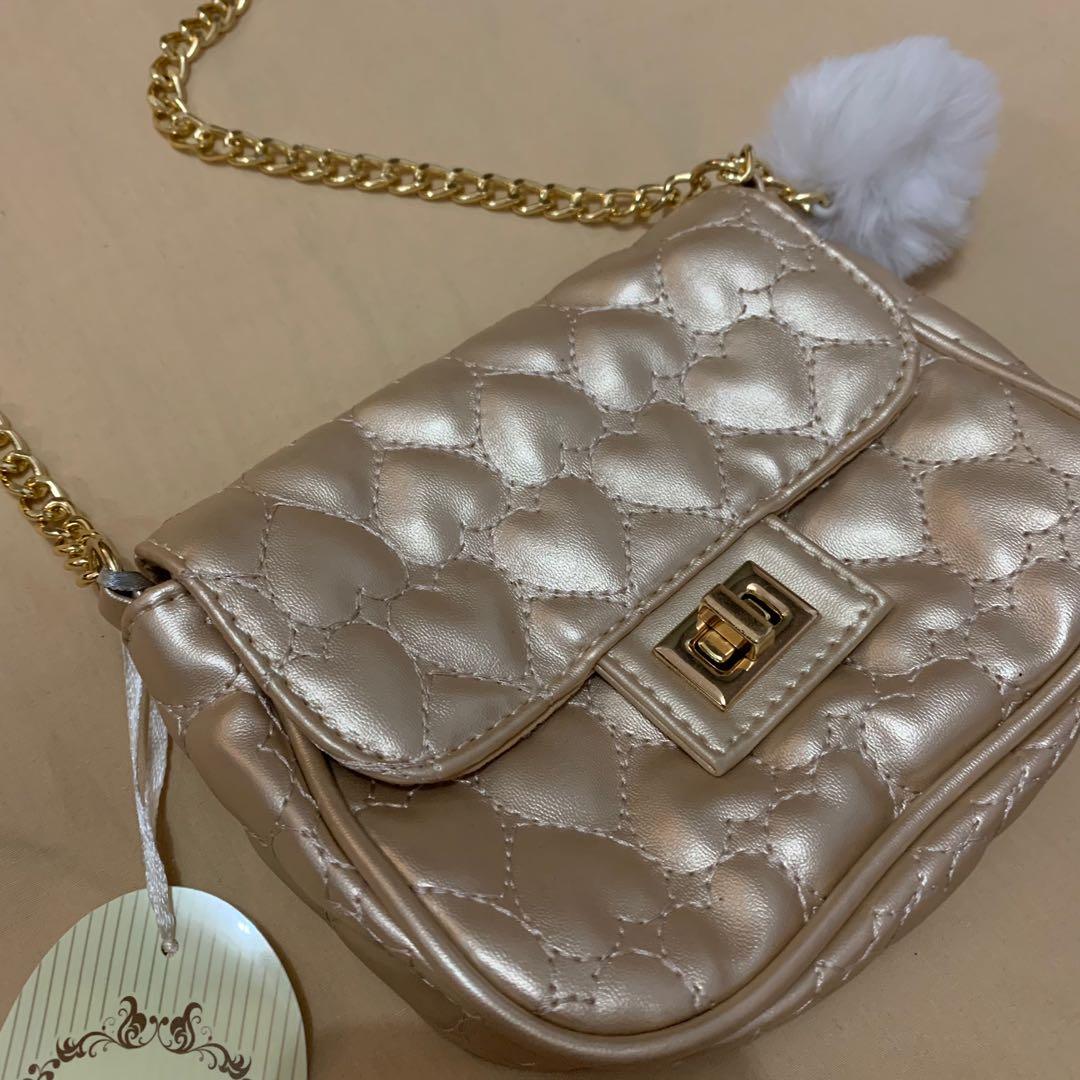 Gold sling bag, Women's Fashion, Bags & Wallets, Cross-body Bags on ...
