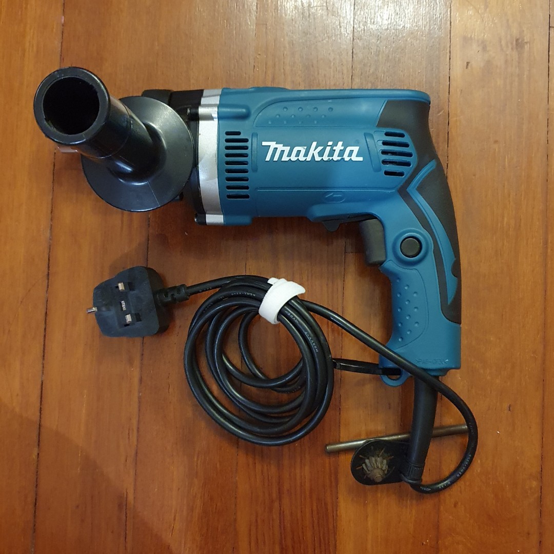 Makita HP1630 hammer drill, Furniture & Home Living, Home Improvement ...
