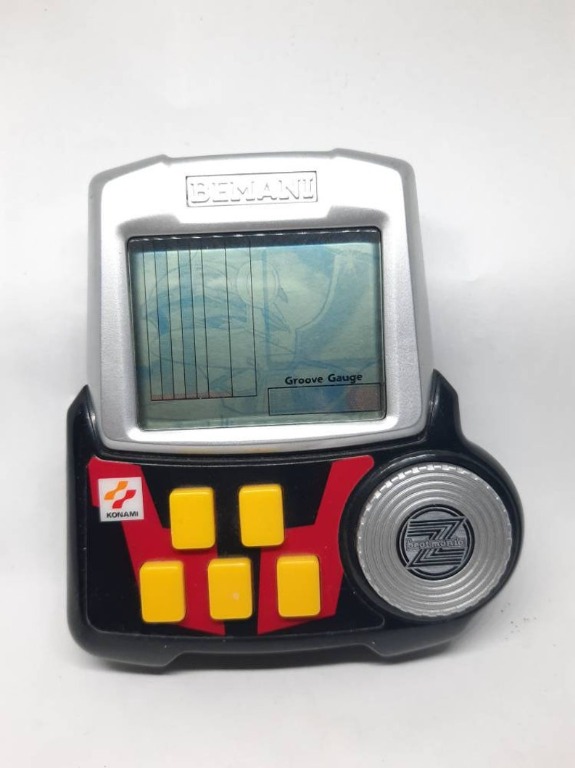 Vintage 1990s Konami Bemani Retro Console Konami Beatmania Pocket ...