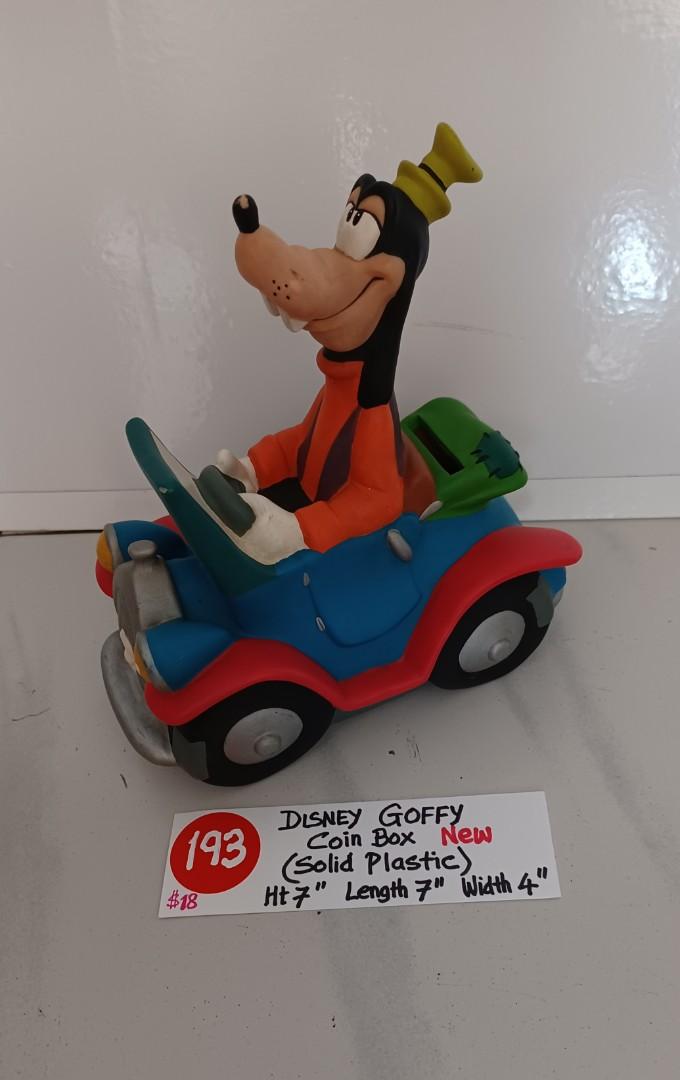 DISNEY GOFFY coin box (NEW). SOLID PLASTIC. Height 7 inches , Length 7 ...
