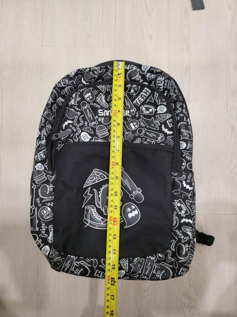 Smiggle dinosaur doddle design school bag, Men's Fashion, Bags ...