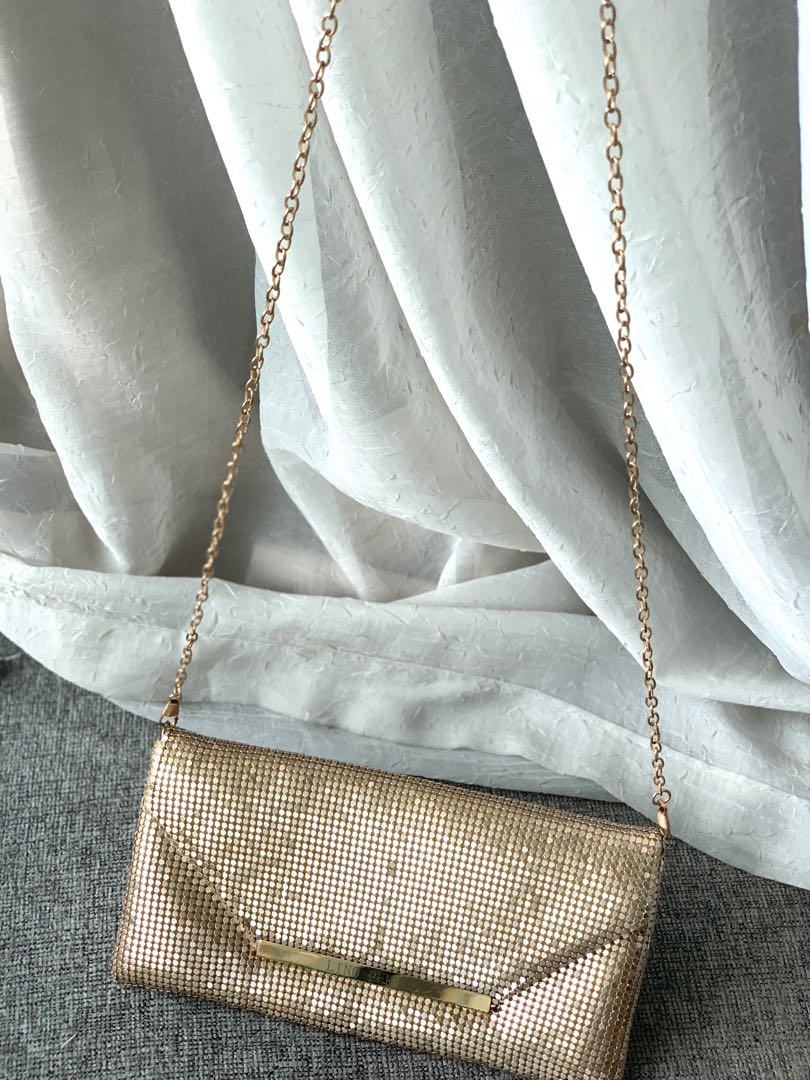 Golden sling bag, Women's Fashion, Bags & Wallets, Clutches on Carousell