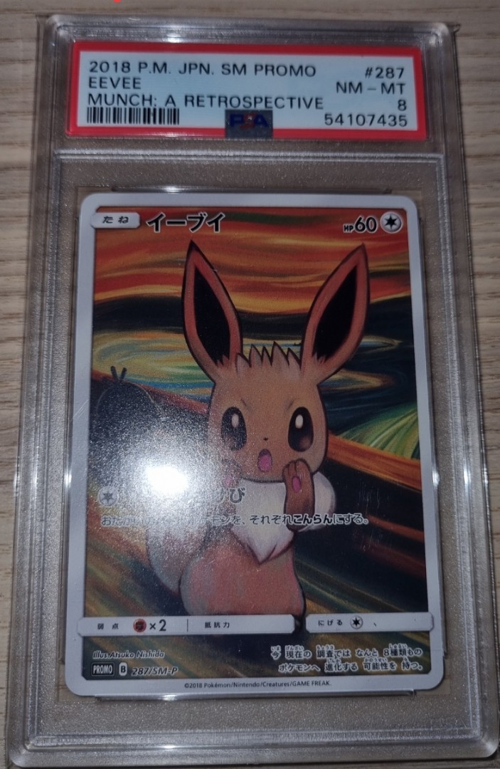 Pokemon PSA8 Eevee Munch Scream, Hobbies & Toys, Toys & Games on Carousell