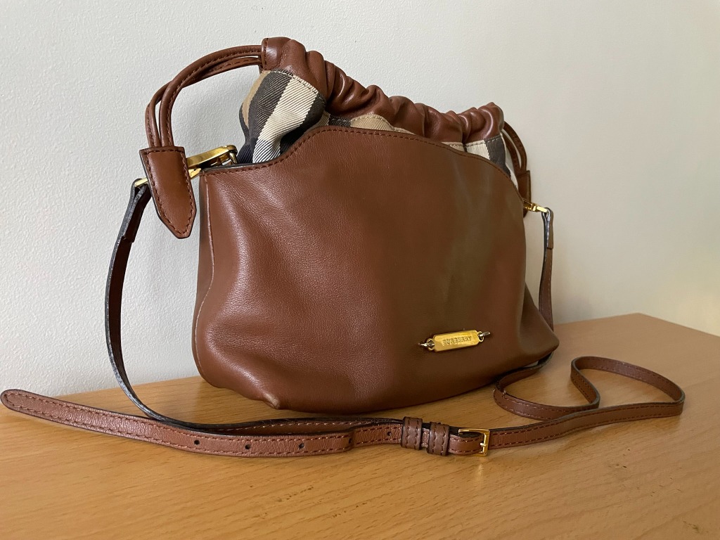 Burberry Draw-string Cross Body Bag, Luxury, Bags & Wallets on Carousell