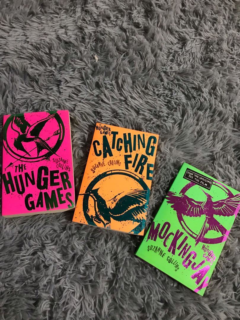 The Hunger Games Trilogy by Suzanne Collins (Propaganda Edition ...