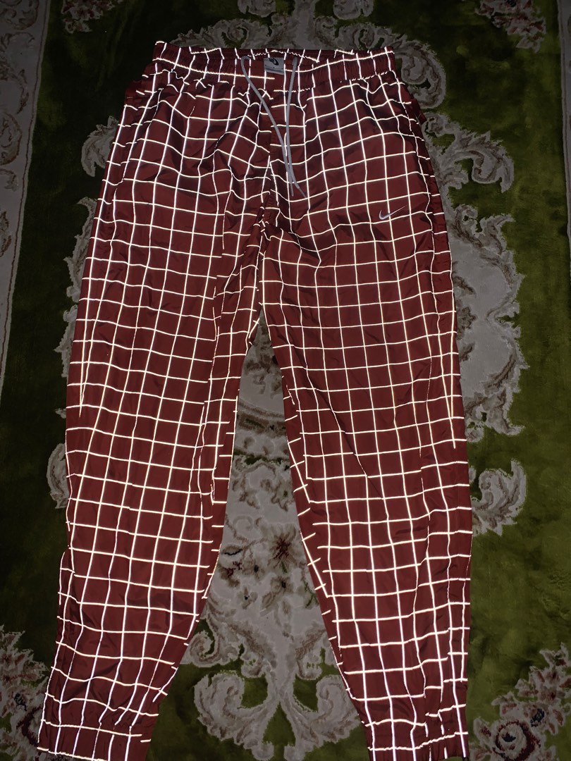 nike authentic reflective track pants, Men's Fashion, Bottoms, Joggers ...