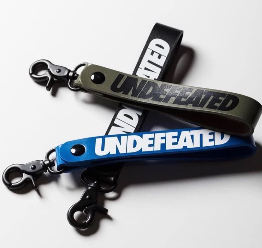 Undefeated Logo Strap Keychain Undftd, Men's Fashion, Tops & Sets ...