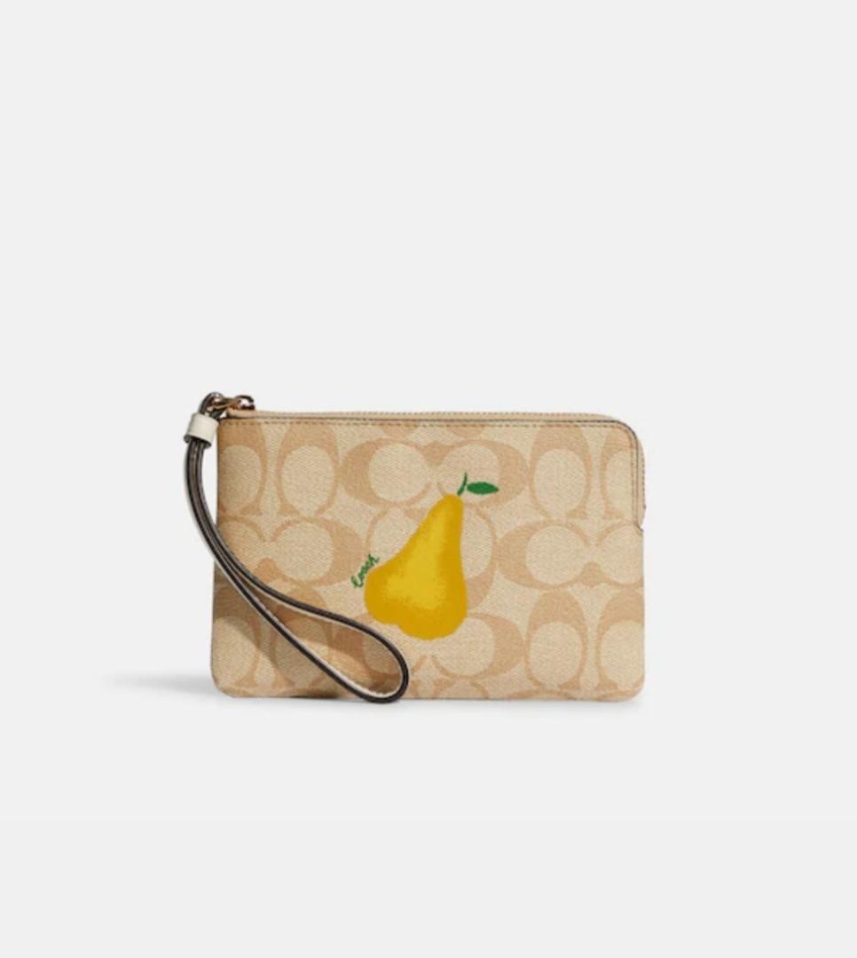 COACH Corner Zip Wristlet In Signature Canvas With Pear, Women's ...