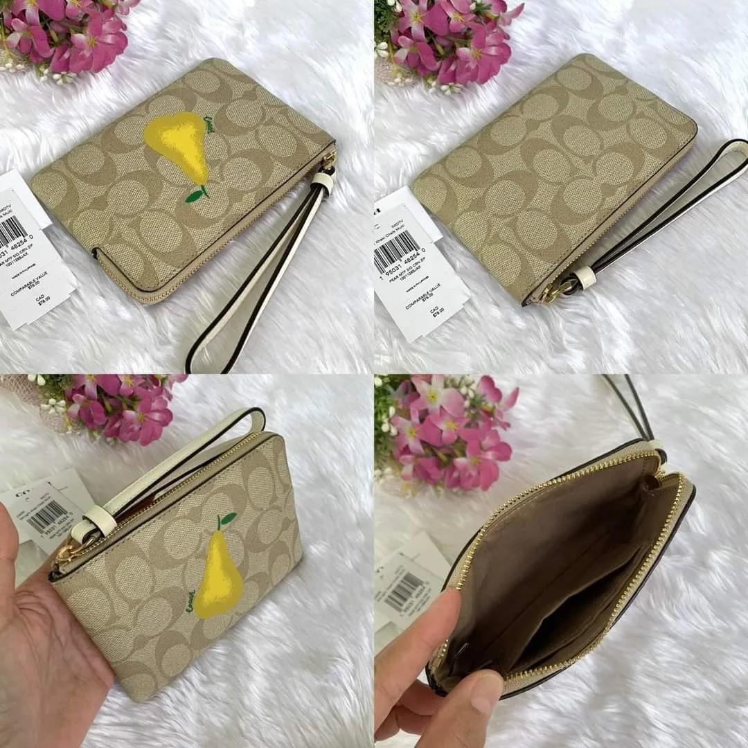 COACH Corner Zip Wristlet In Signature Canvas With Pear, Women's ...