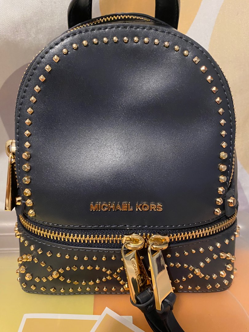 Michael Kors Rhea mini 2 way Backpack, Luxury, Bags & Wallets on Carousell