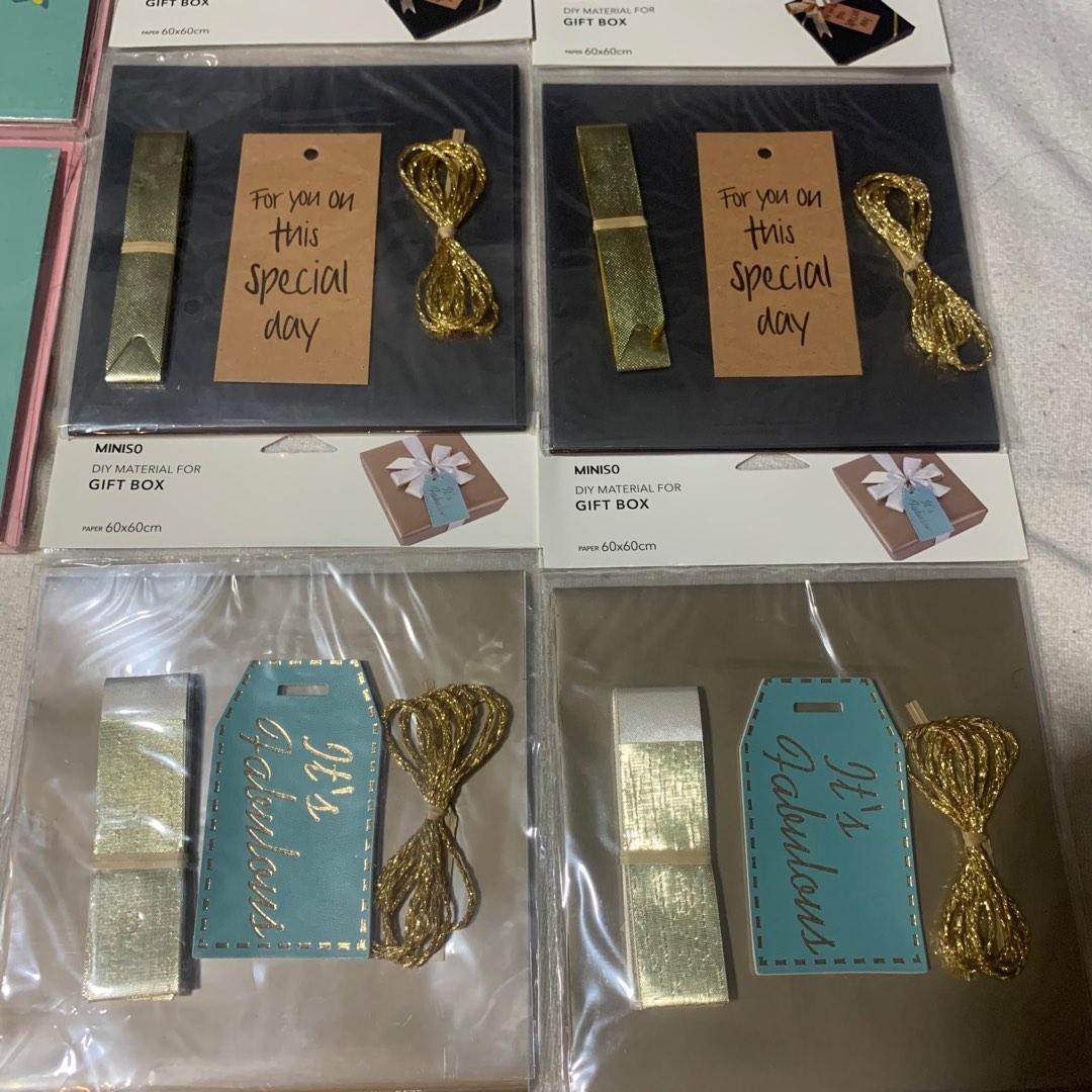 Miniso Pop up greeting cards and gift box paper with ribbons and golden ...