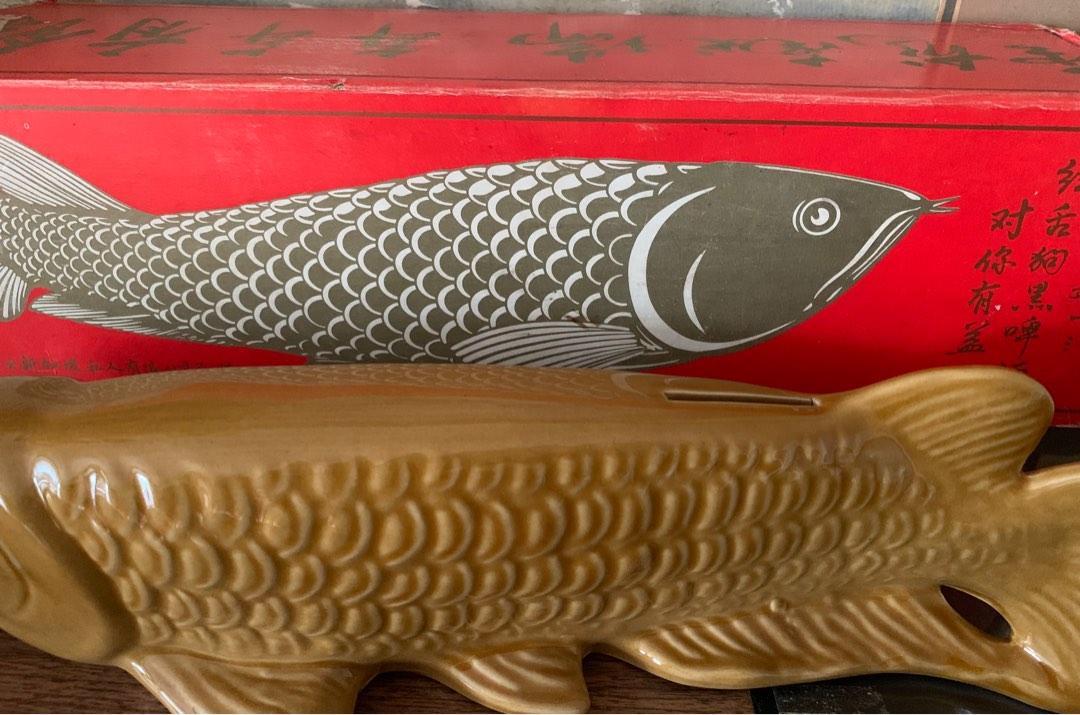 1980s Golden ceramic arowana fish coin bank 39cm long - by Guinness ...