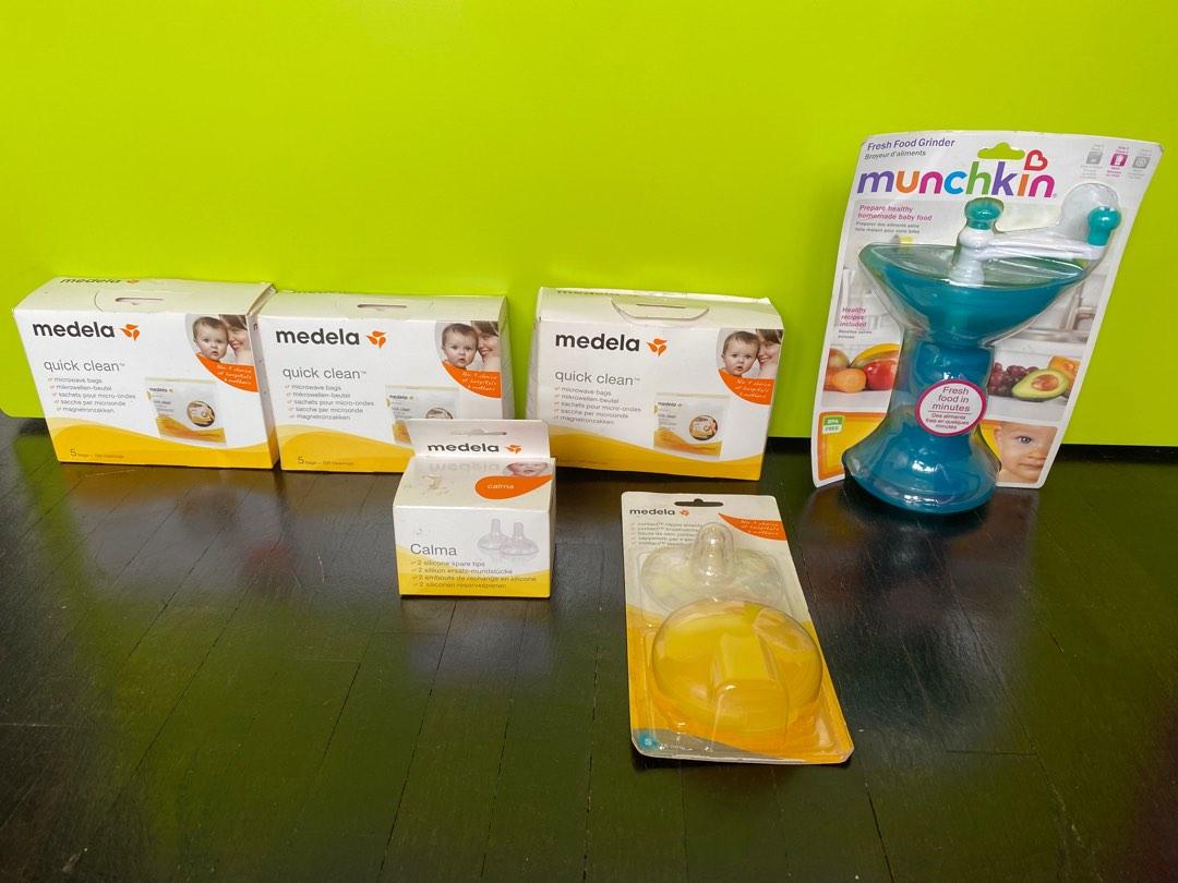Medela microwave bags, nipple shield, spare tips and Munchkin food ...
