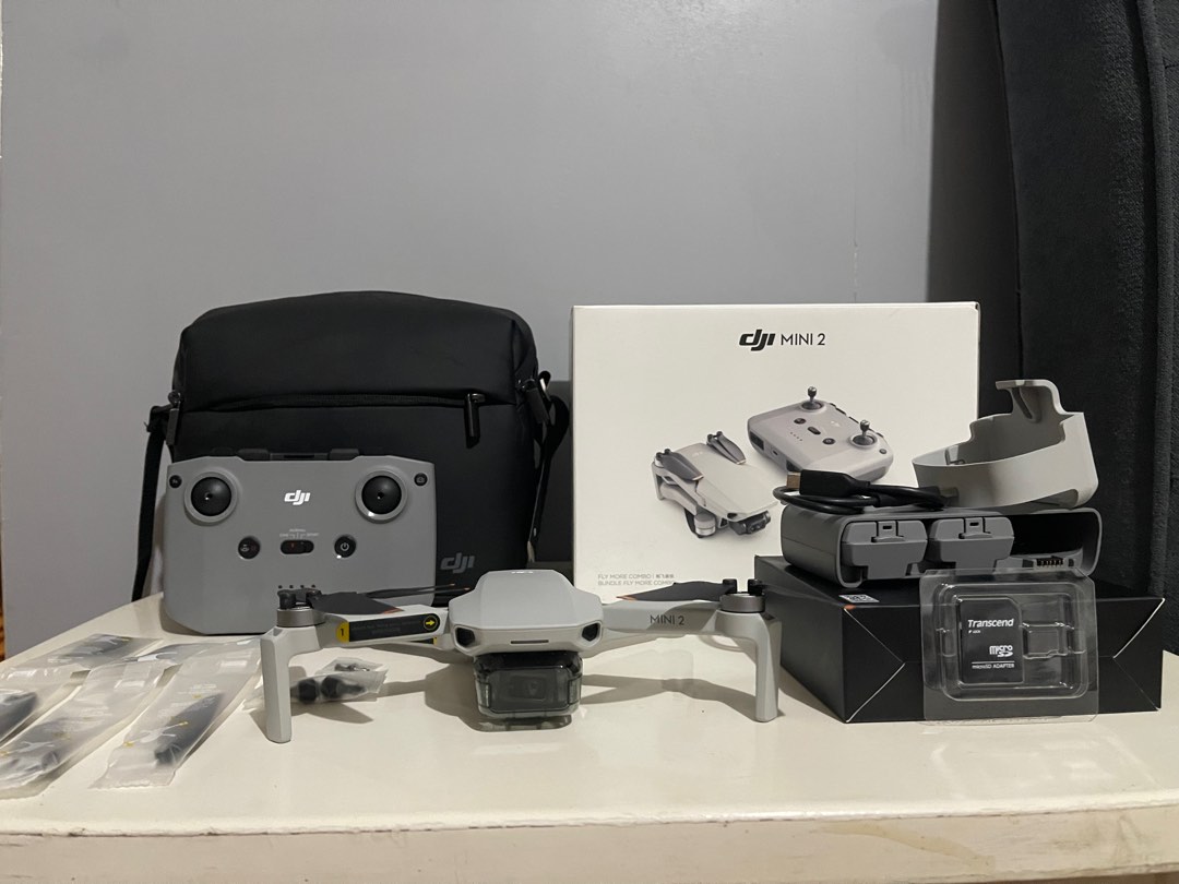 DJI Mini 2 Fly More Combo, Photography, Drones on Carousell