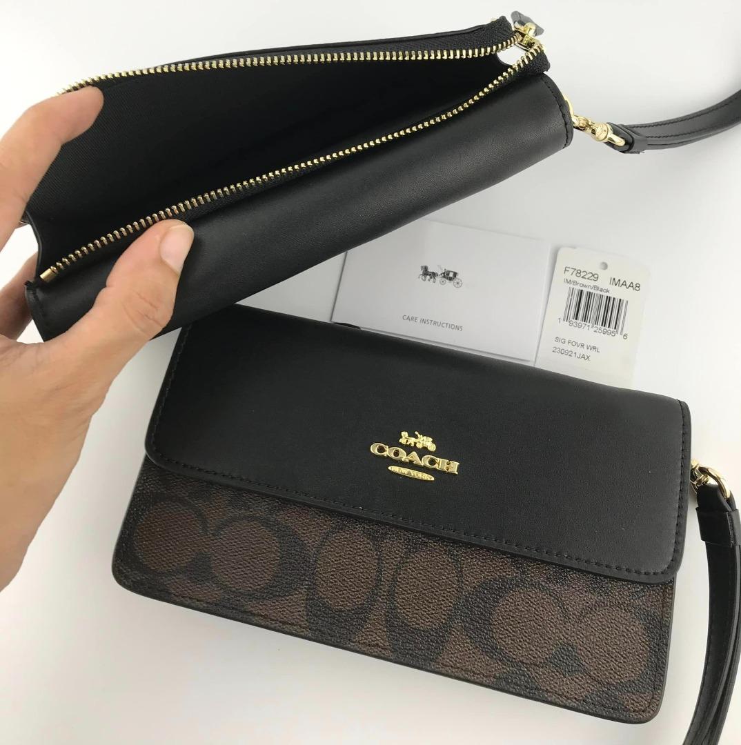 FOLDOVER WRISTLET IN SIGNATURE CANVAS, Women's Fashion, Bags & Wallets ...