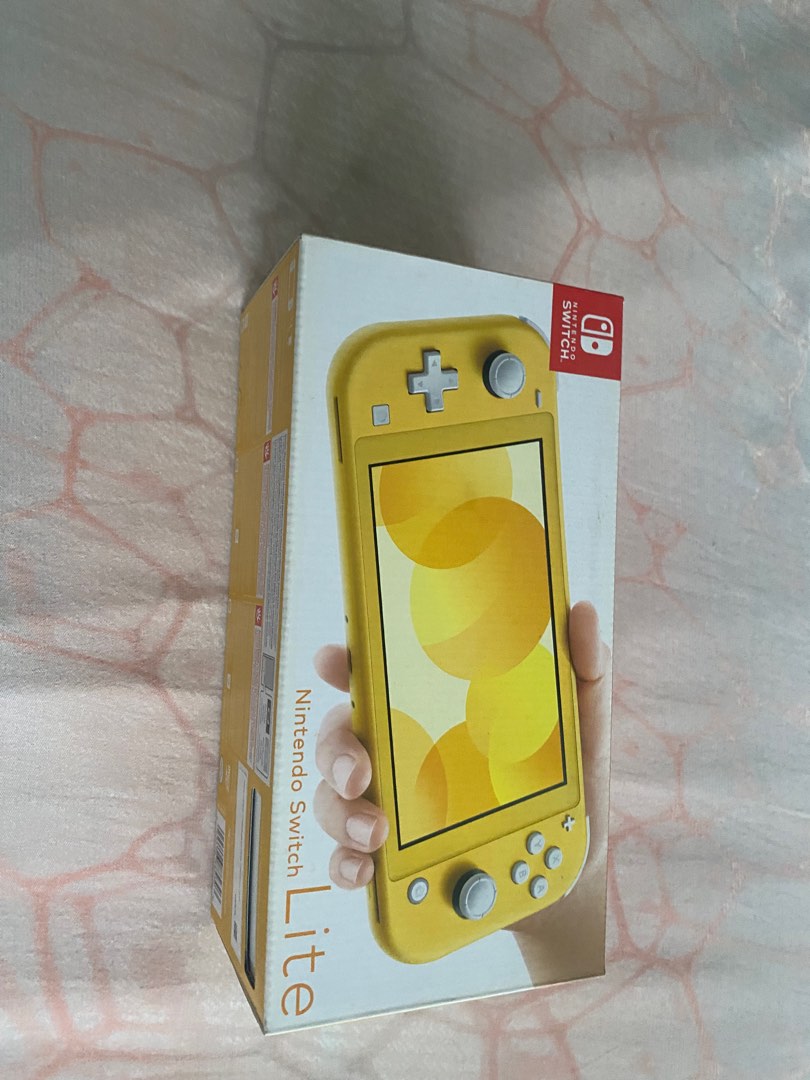 Nintendo Switch Lite Yellow, Video Gaming, Video Game Consoles ...