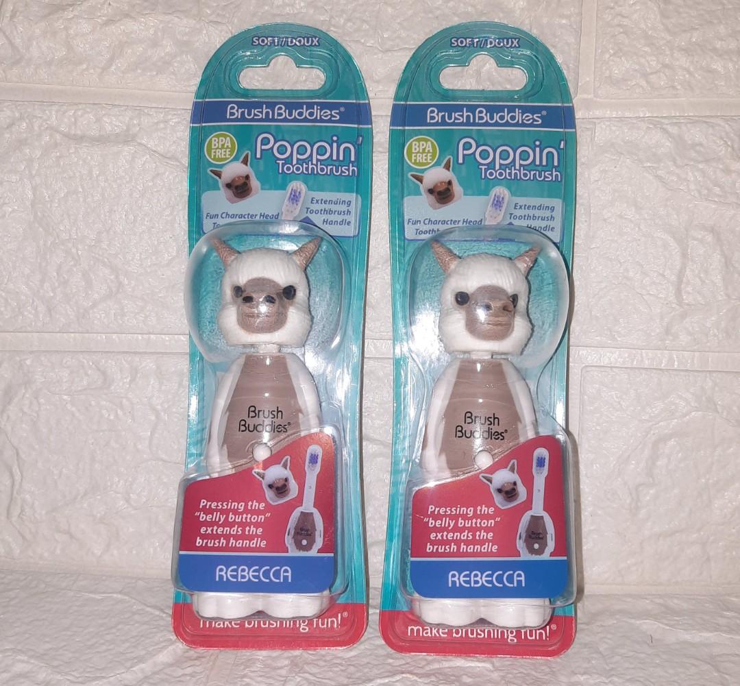 Brush Buddies Poppin' Toothbrush (pressin belly button extends the ...