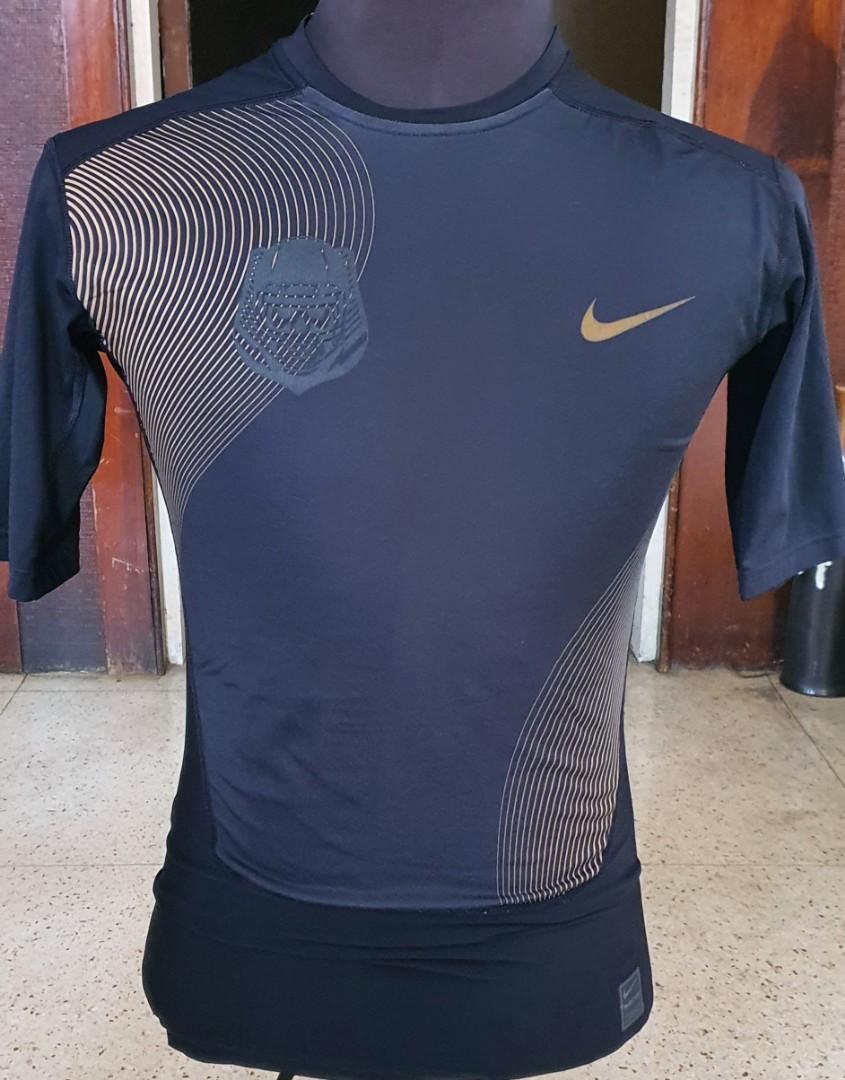 Nike Pro dri-fit compression shirt, black and gold, Men's Fashion ...