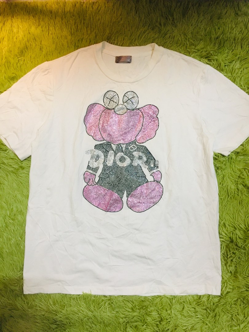 Dior x kaws tee, Luxury, Apparel on Carousell