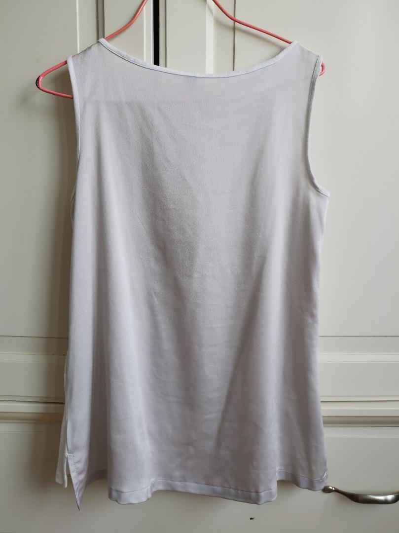 very light and soft, white in front, the back is soft satin in light ...