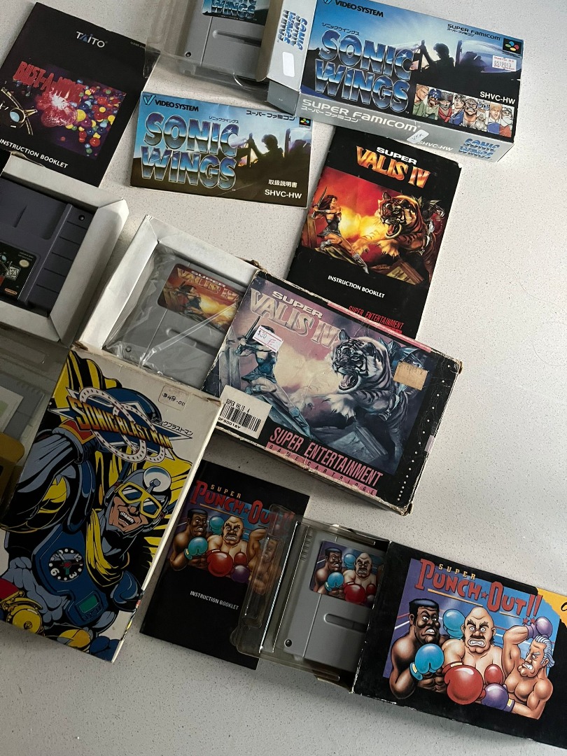 7 games cart with boxes and booklets as per pics together 99sgd can ...