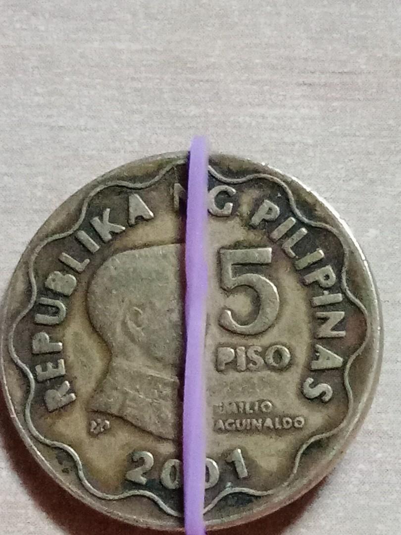 BSP 5 piso error coins-rotated die,with extra metal's on rings and on ...