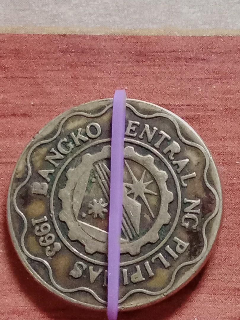 BSP 5 piso error coins-rotated die,with extra metal's on rings and on ...