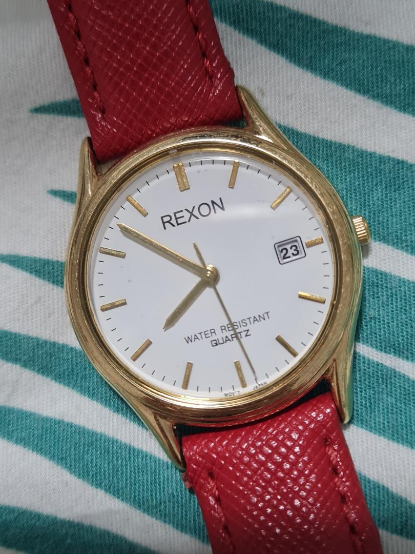 Ricoh Rexon Gold Quartz Watch with Date Good Working Condition Free ...