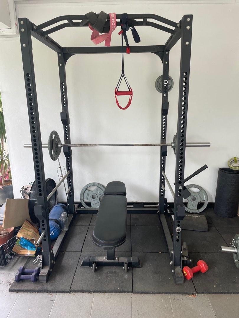 Squat rack with Oly bar, 120kg of plates, EZ curl bar, plus 23 heavy ...