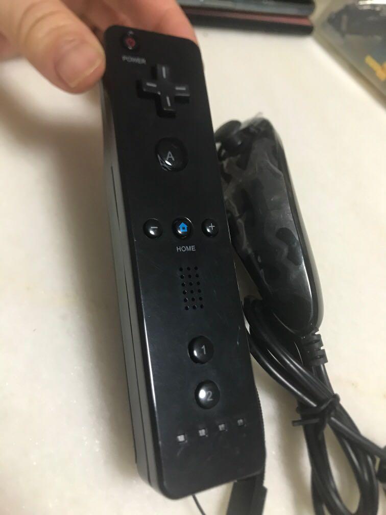 Wii controller with nunchucks, Video Gaming, Gaming Accessories ...