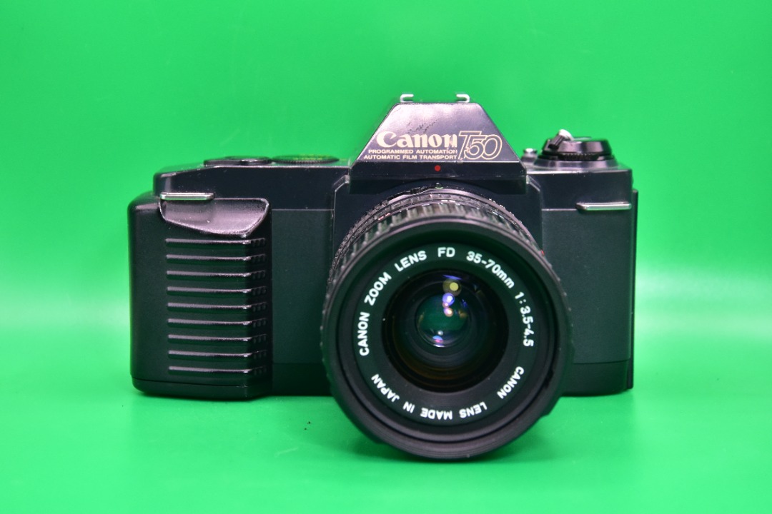Canon T50 Film Camera (1983) with 35-70 mm FD Canon lens, Photography, Cameras on Carousell