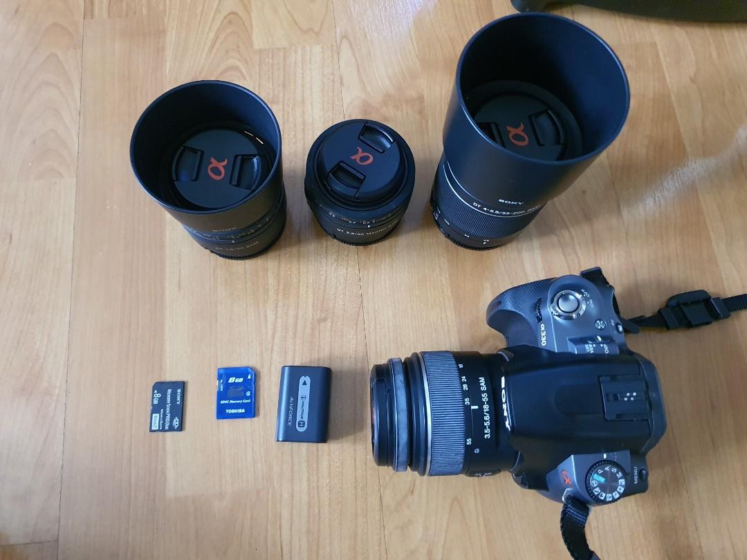 Sony Alpha 330 with many lenses, Photography, Cameras on Carousell