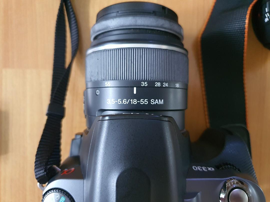 Sony Alpha 330 with many lenses, Photography, Cameras on Carousell