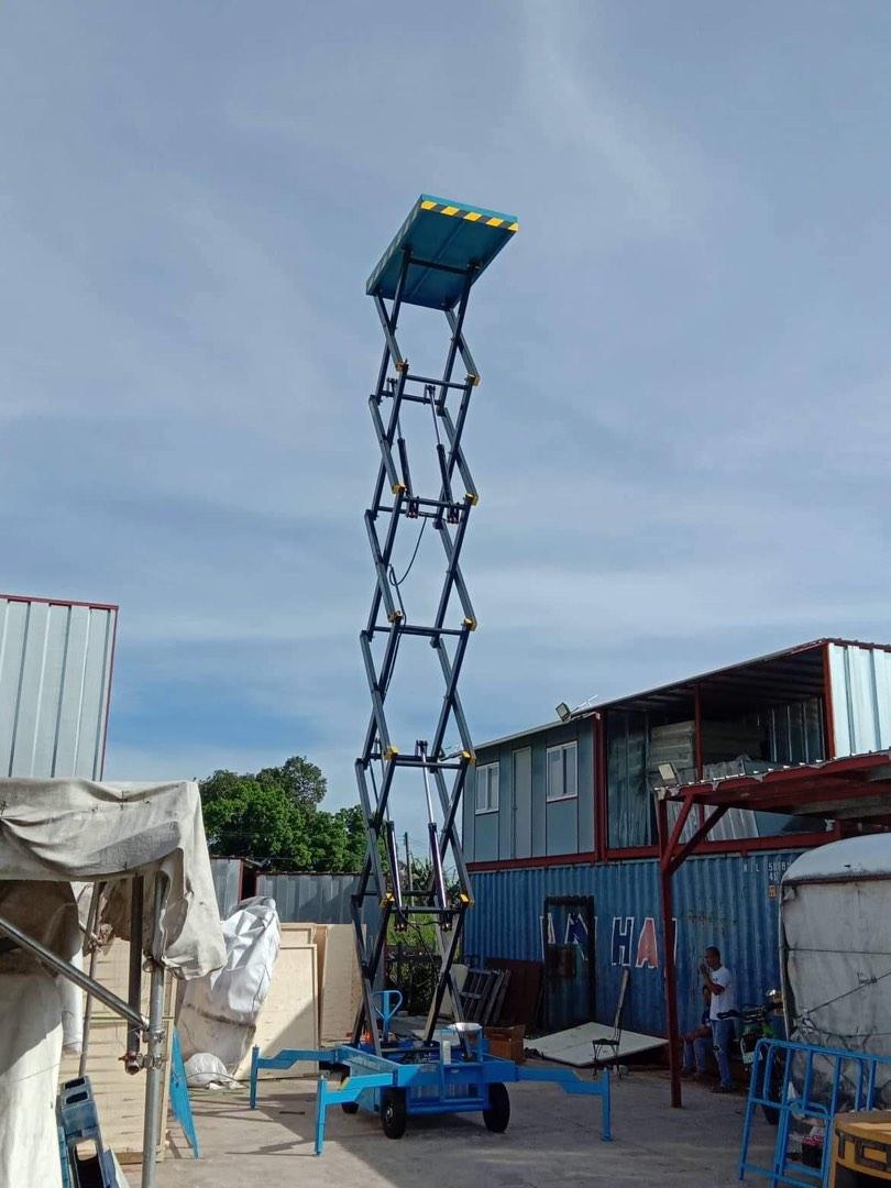 Mobile scissor lift 10 meters 500 KG, Commercial & Industrial ...