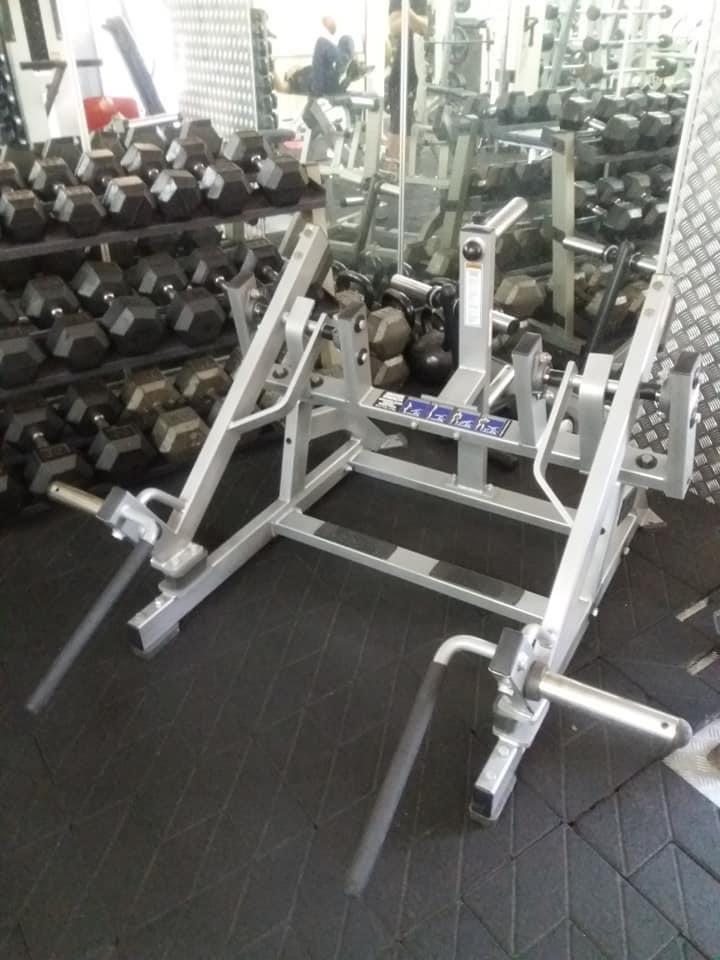 Hammer strength plate loaded squat high pull ground based gym strength ...