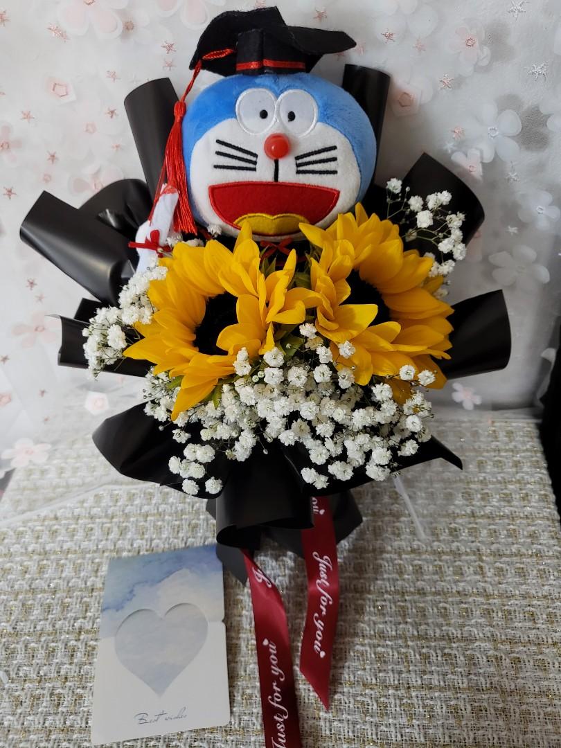 Graduation Bouquet/Fresh sunflower graduation Doraemon soft toy Bouquet ...