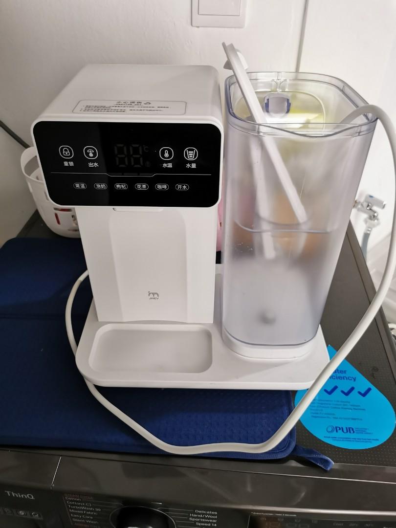 Instant hot water dispenser with attached water pitcher, TV & Home ...