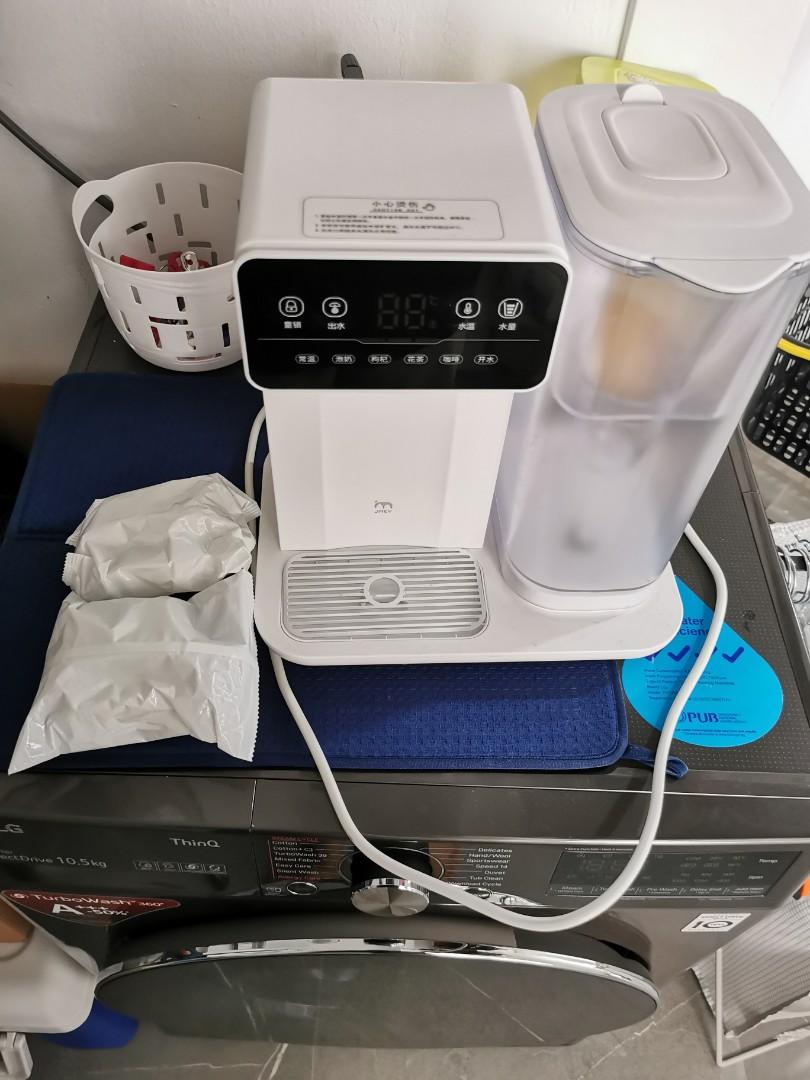 Instant hot water dispenser with attached water pitcher, TV & Home ...