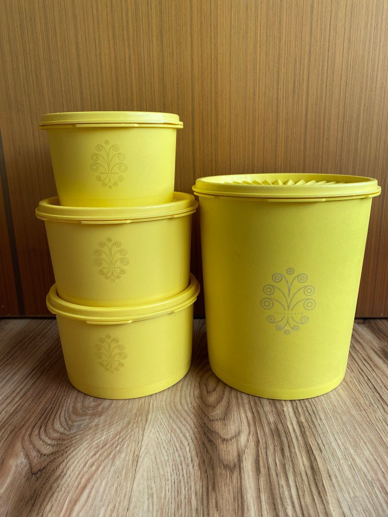 Set of 4 vintage Tupperware cylinder containers. Never been used ...