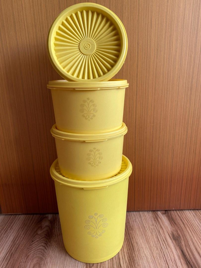 Set of 4 vintage Tupperware cylinder containers. Never been used ...